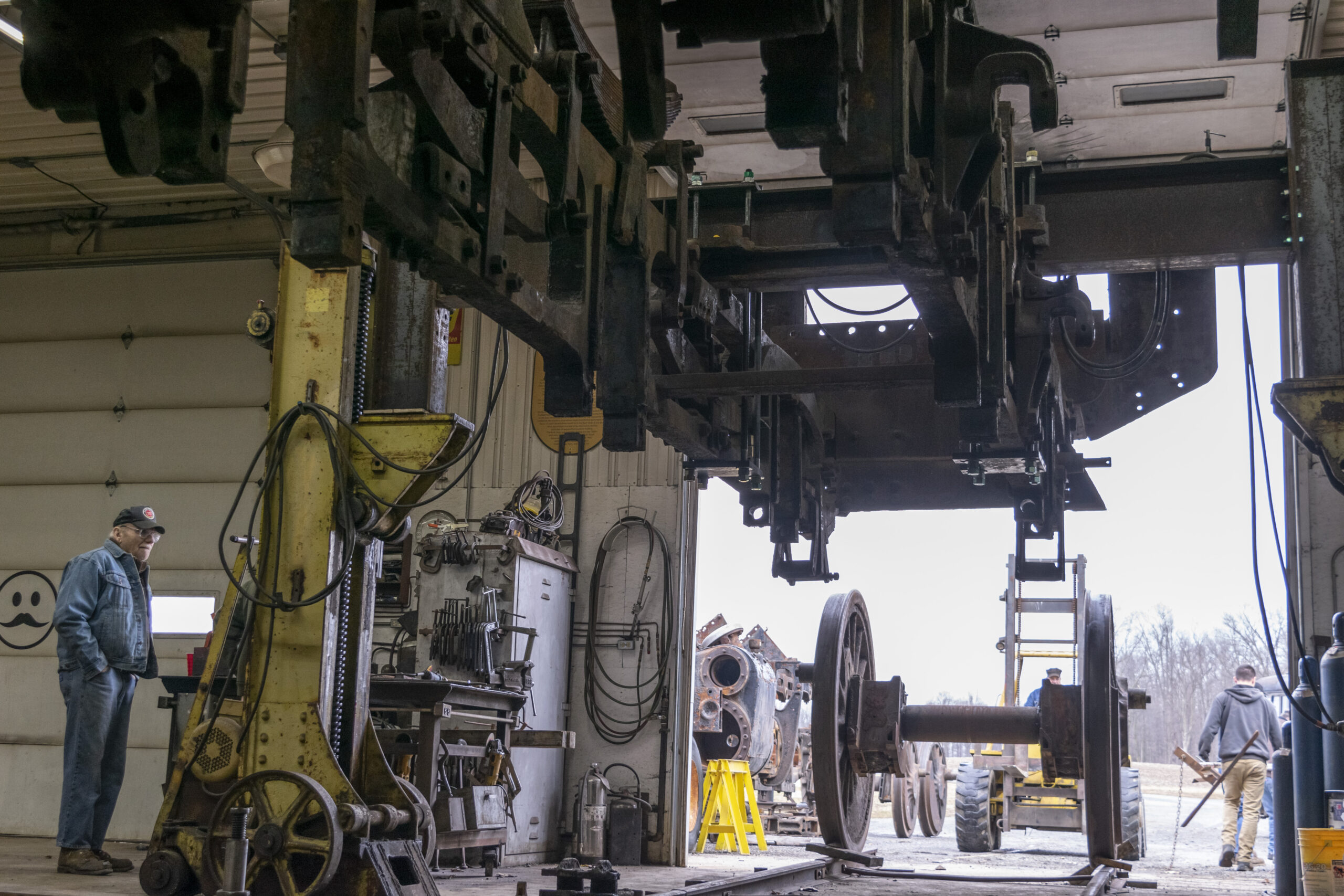 CNW 175 Frame & Running Gear Lifted for Rebuild - Steam Railroading ...